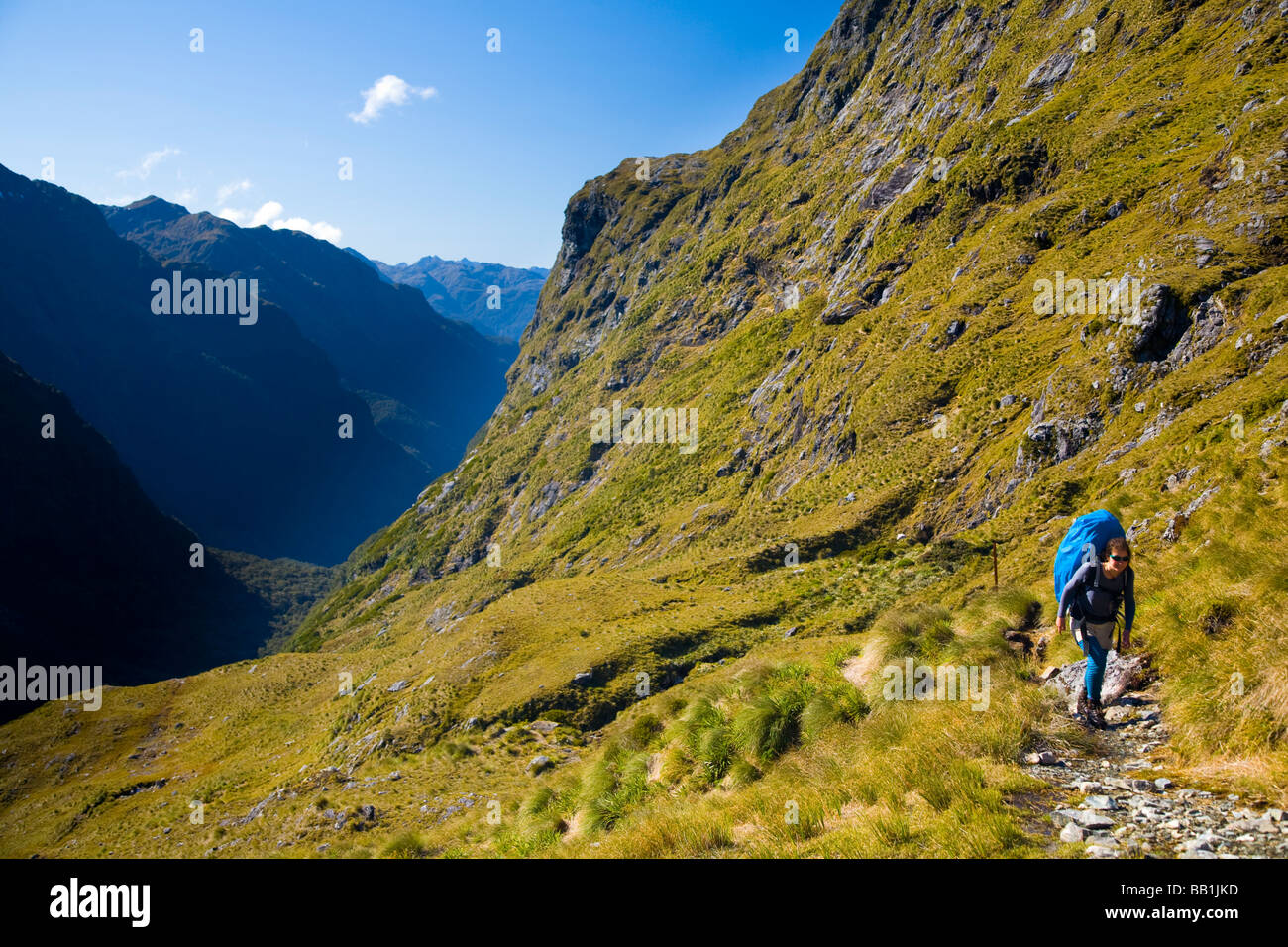 New Zealand Southland Fiordland National Park Tramper heading towards ...