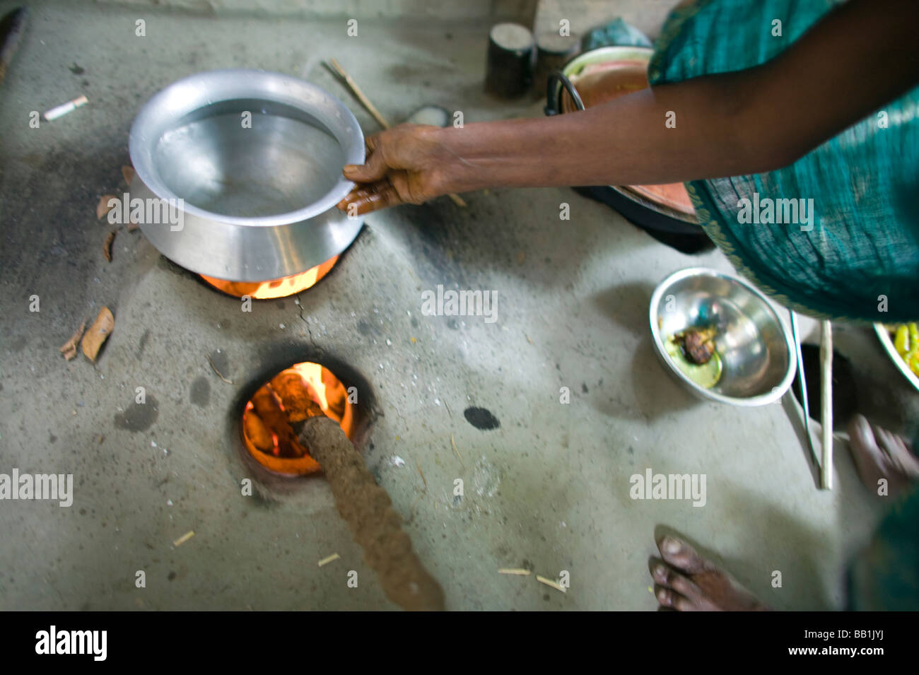 Typical home, elder woman cooking, rural Bangladesh Stock Photo - Alamy