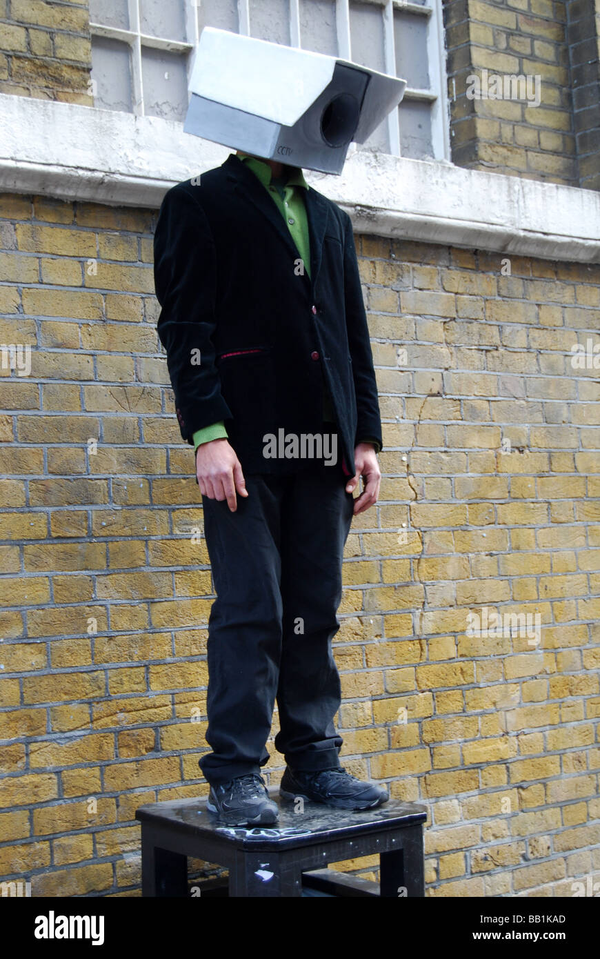 CCTV camera street performer "big brother Stock Photo - Alamy