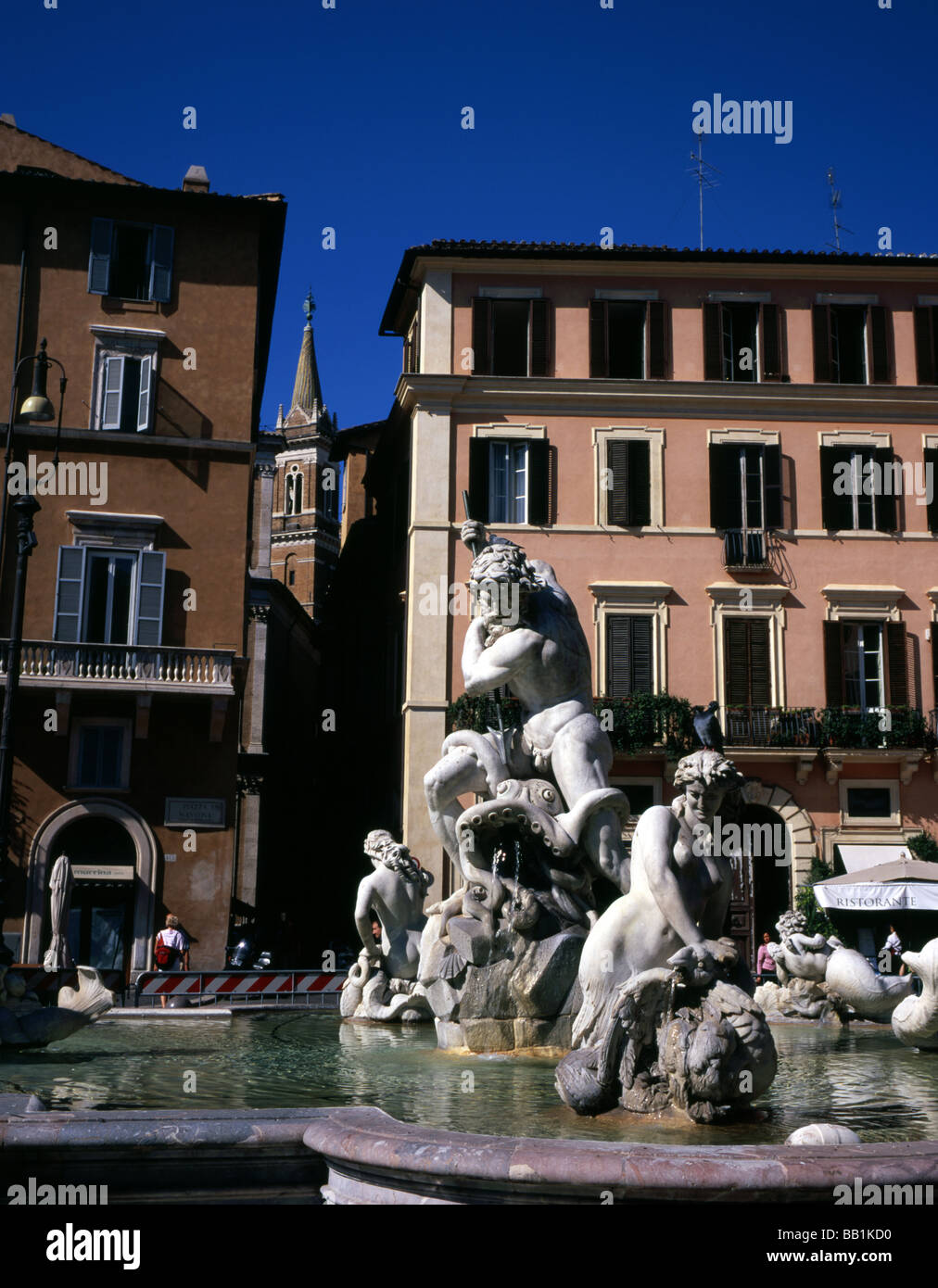 Fountain depicting Neptune The Piazza Navona the spire of the church of ...