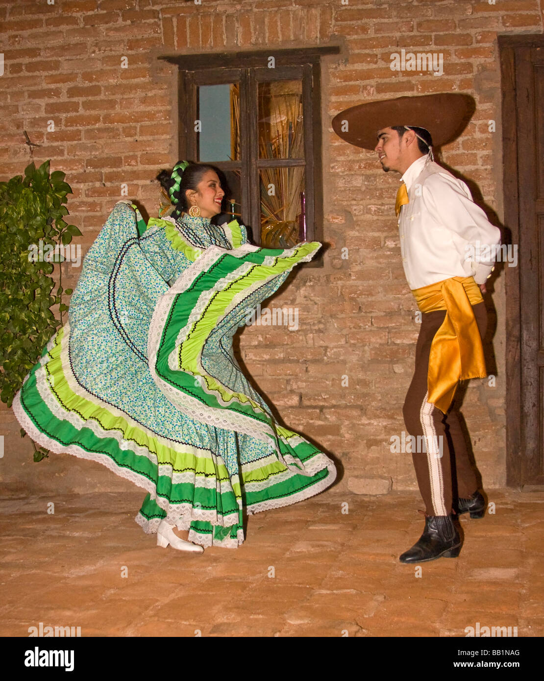Man and woman perform Spanish style dances in El Fuerte Mexico Stock ...
