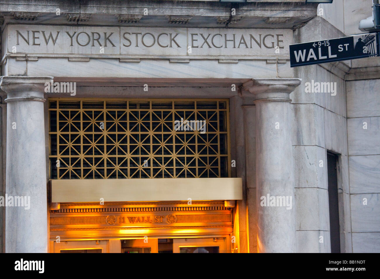 New York Stock Exchange and Wall Street Sign in Manhattan Stock Photo ...