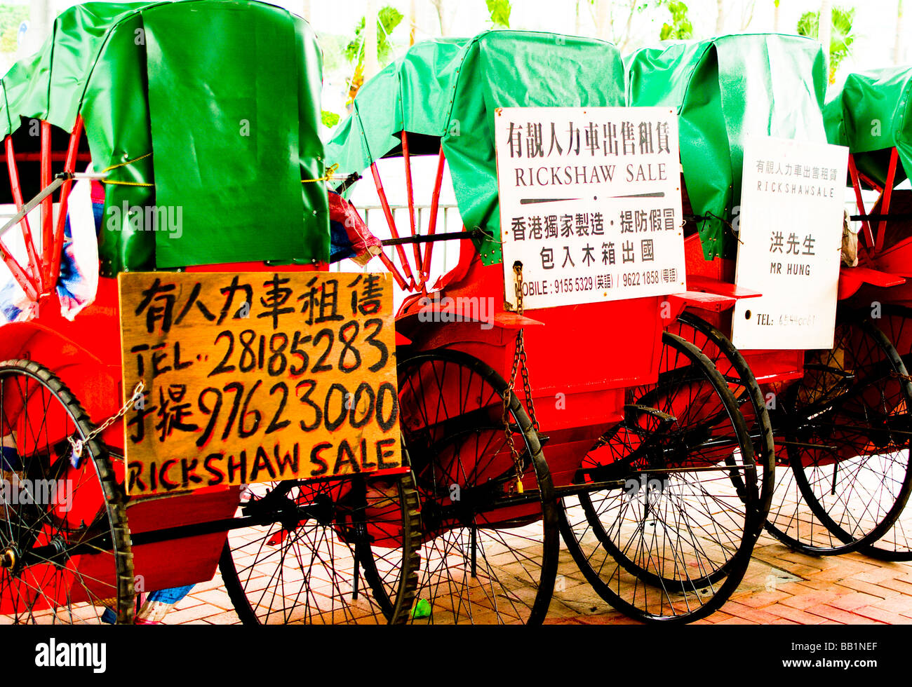 Asia, China, Hong Kong. Used rickshaws for sale on Central District ...