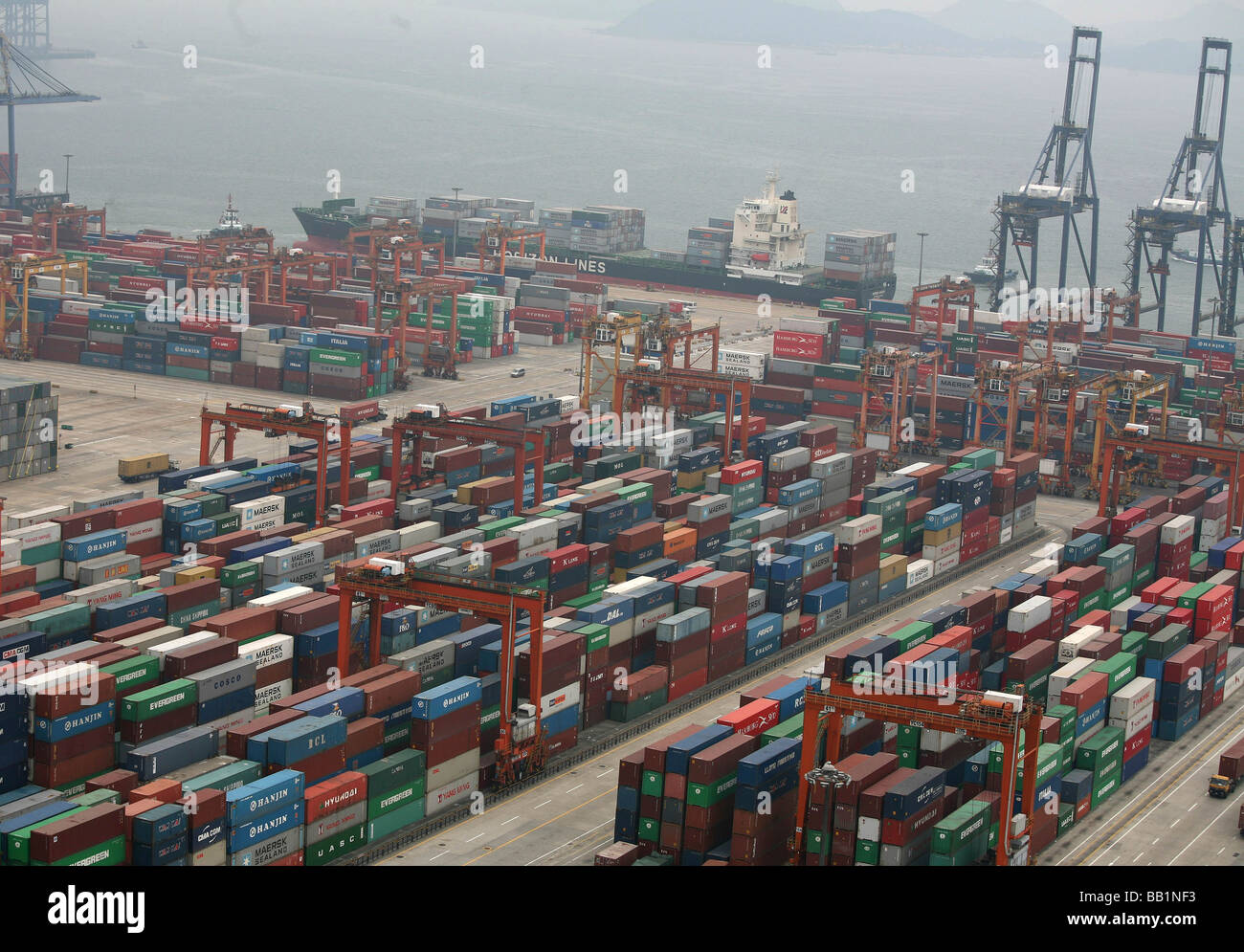 Container ships being loaded in the port of Shenzhen, China Stock Photo ...
