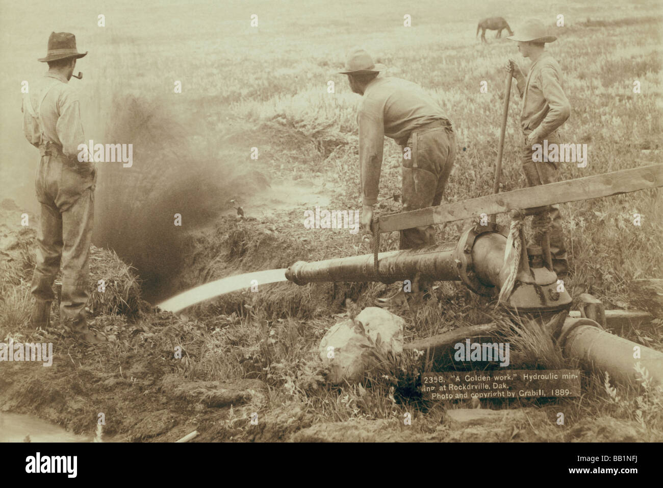 A Golden work. Hydraulic mining Stock Photo - Alamy