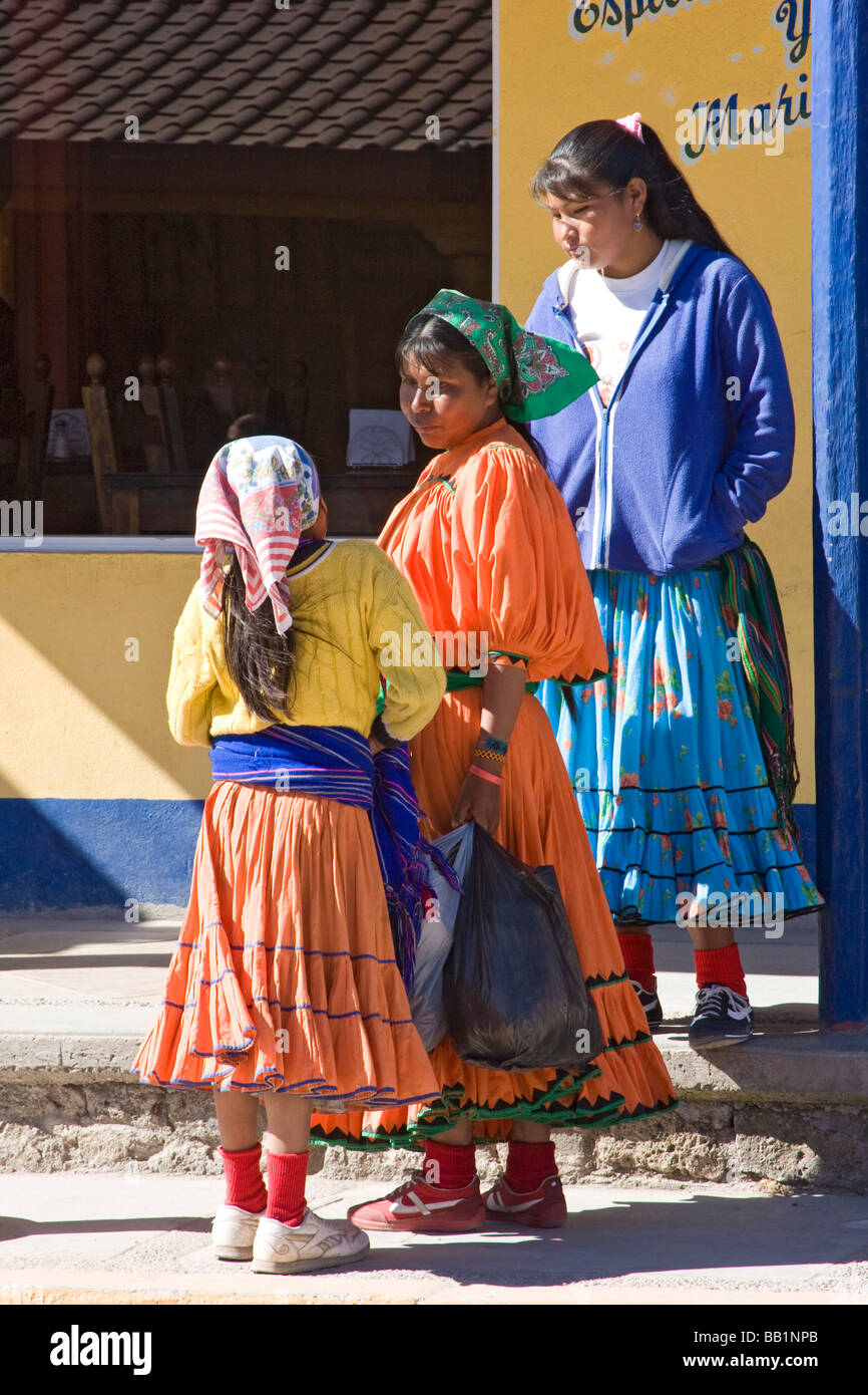 Tarahumara native Indian women stand on the main street in Creel, a ...