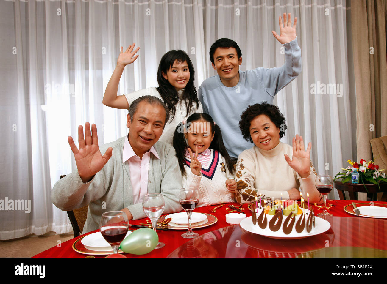 Chinese family having birthday party,China Stock Photo - Alamy