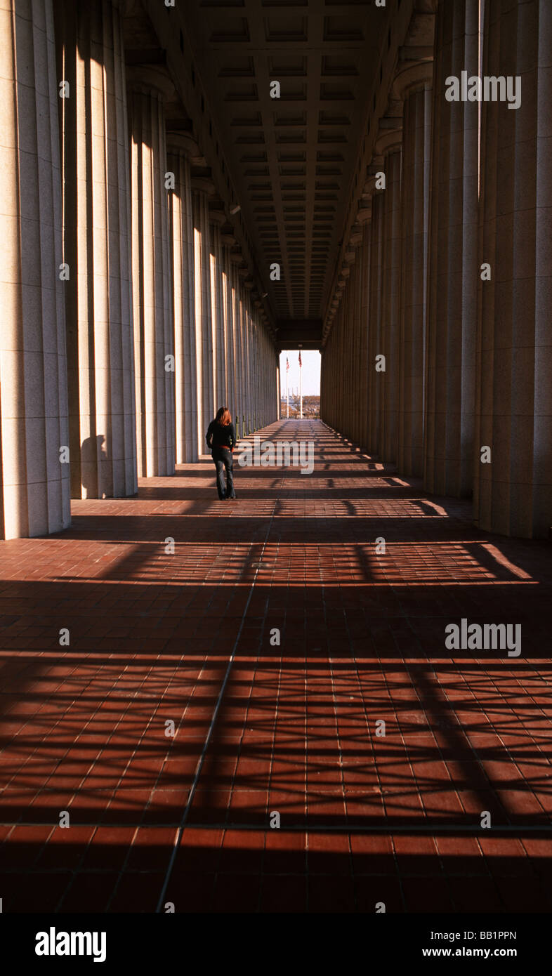 A woman walks in the old section of Soldier Field in Chicago, Illinois ...