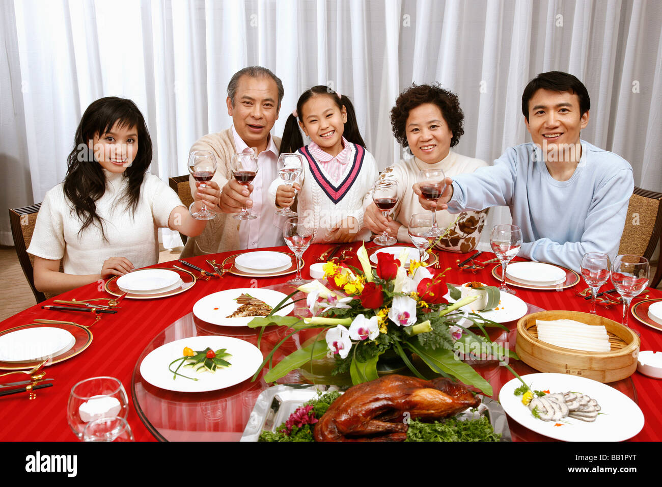 Chinese family getting together hi-res stock photography and images - Alamy