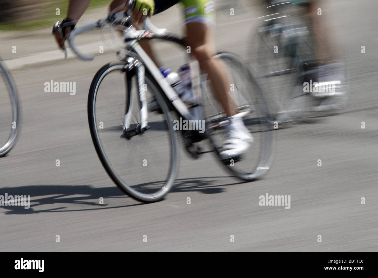 professional bike rider in road street race in city town Stock Photo ...