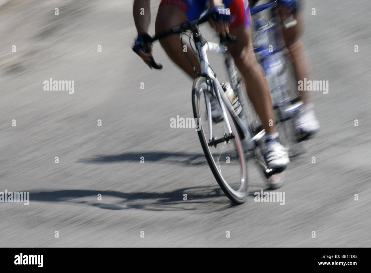 professional bike riders in road street race in city town Stock Photo ...