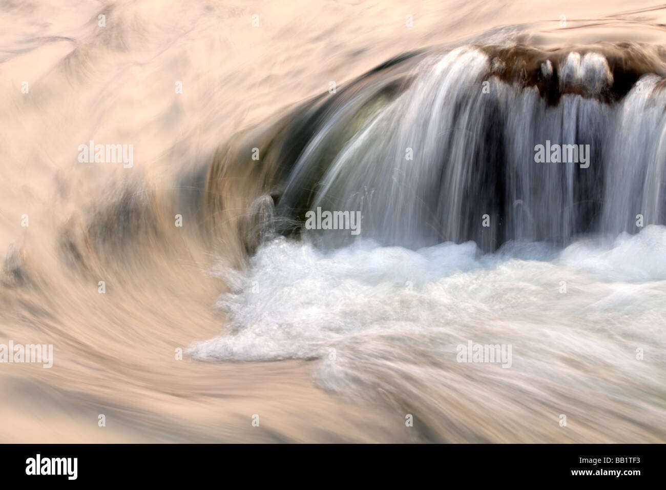 Water flowing over rocks taken with a slow shutter speed Stock Photo ...