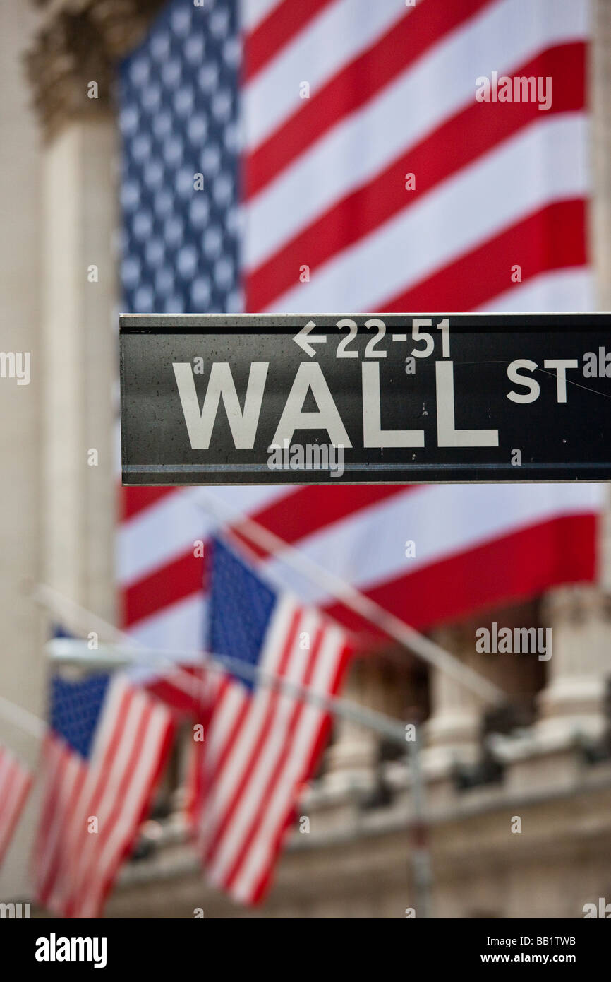 Wall Street Sign in front of the New York Stock Exchange Stock Photo ...