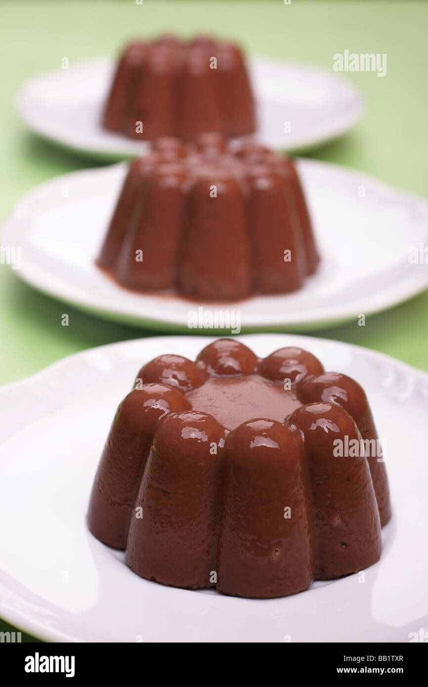 Three homemade chocolate pudding desserts in a row Stock Photo - Alamy