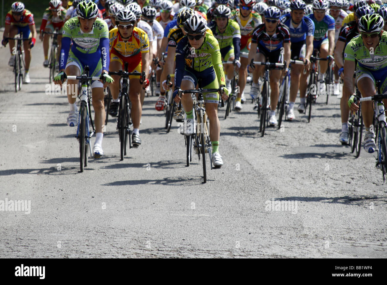 professional bike riders in road street race in city town Stock Photo ...