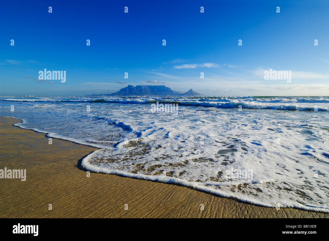 The classic view of Table Mountain from Table View Beach, Cape Town ...