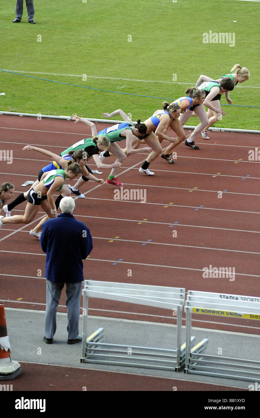 Young Athletes at start of 100 metres race Stock Photo - Alamy