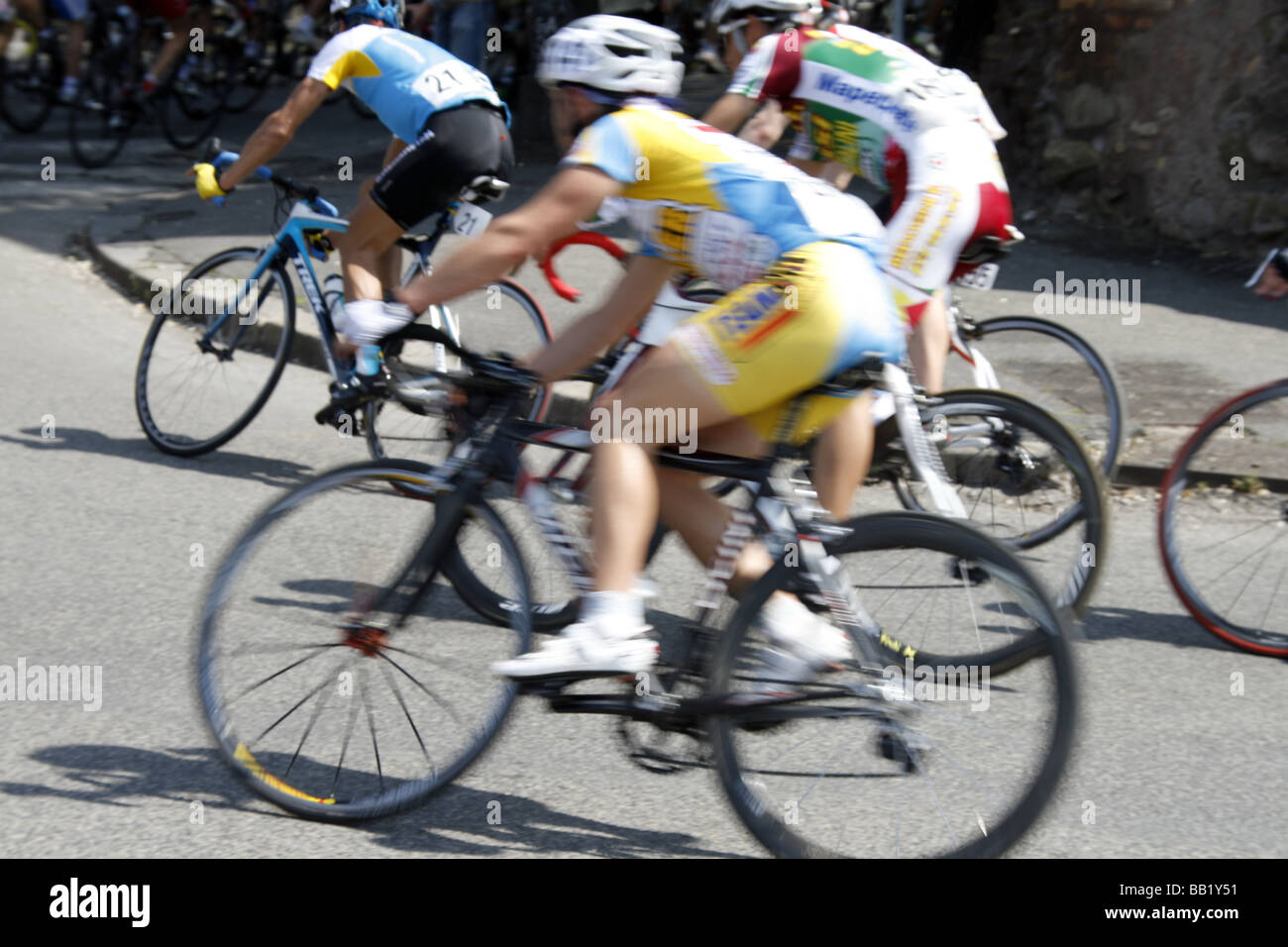 professional bike riders in road street race in city town Stock Photo ...