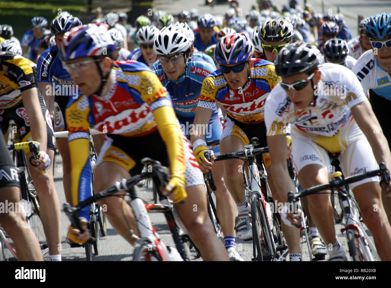 professional bike riders in road street race in city town Stock Photo ...