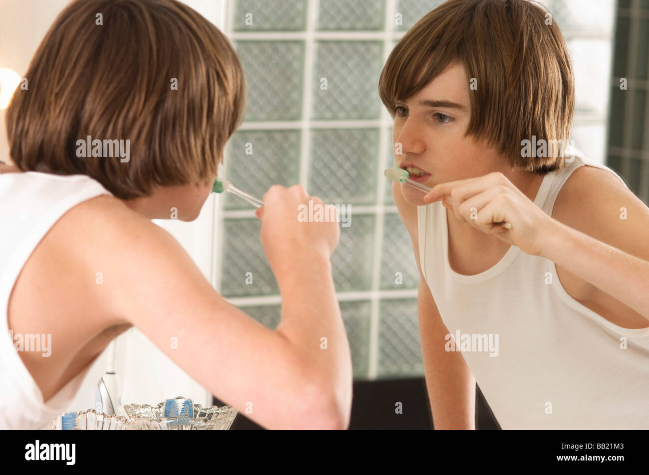 Boy brushing his teeth Stock Photo - Alamy