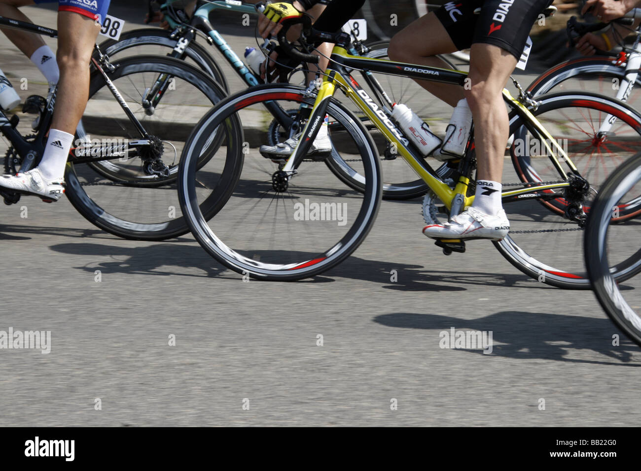 professional bike riders in road street race in city town Stock Photo ...
