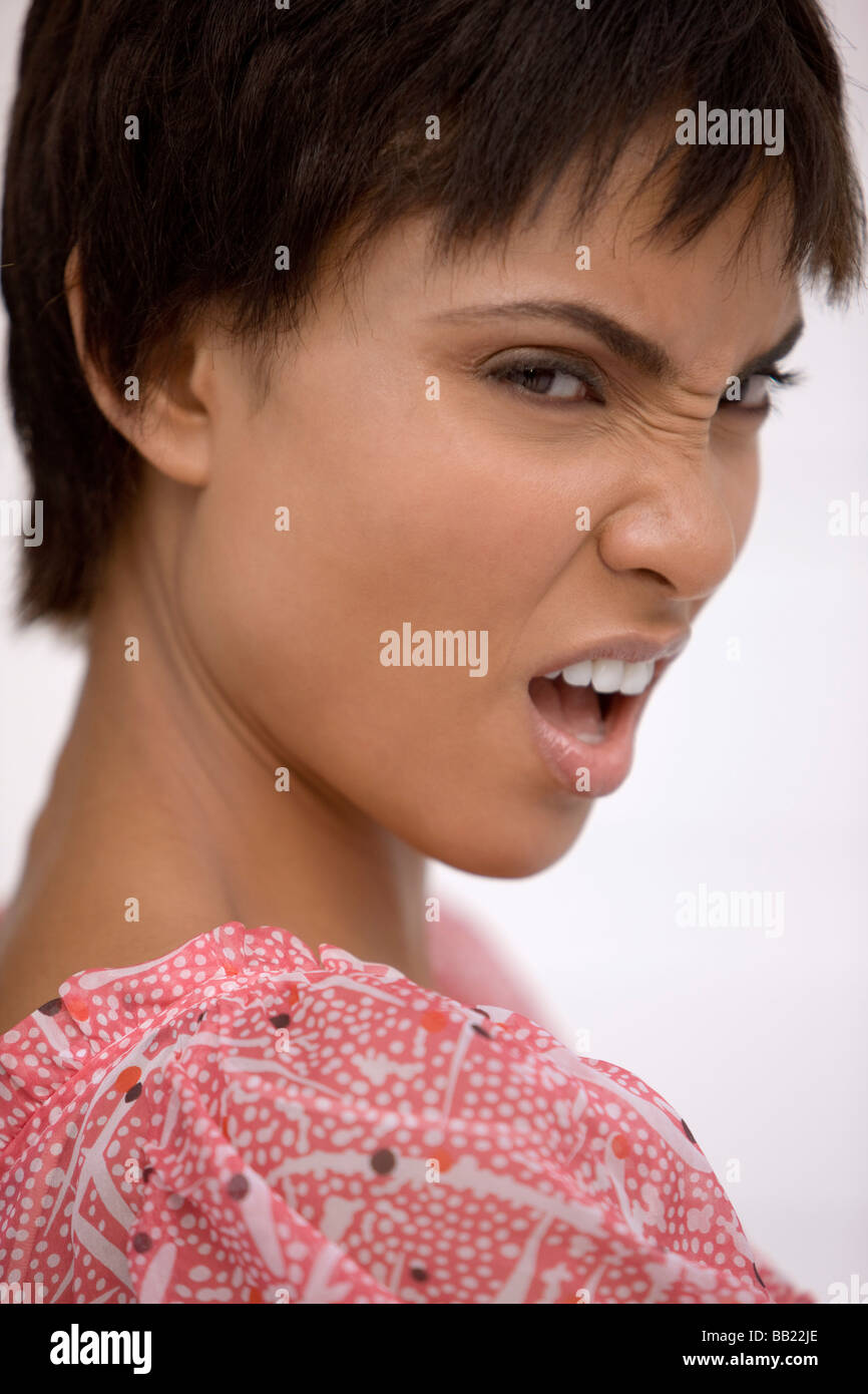Portrait of a woman making a face Stock Photo - Alamy