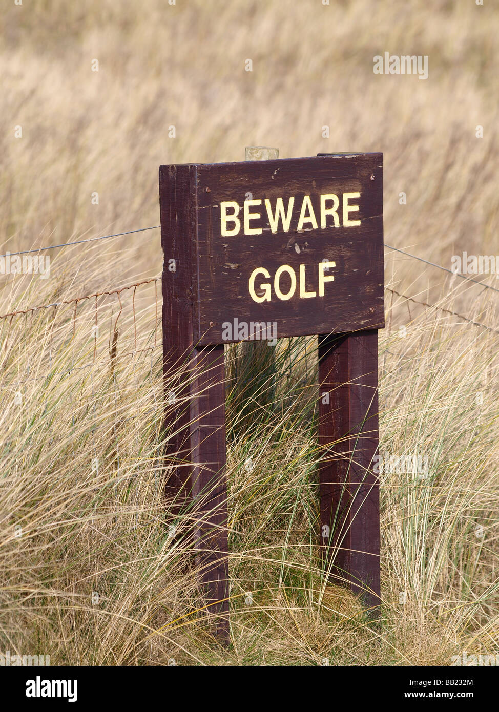 Beware Golf sign Stock Photo - Alamy