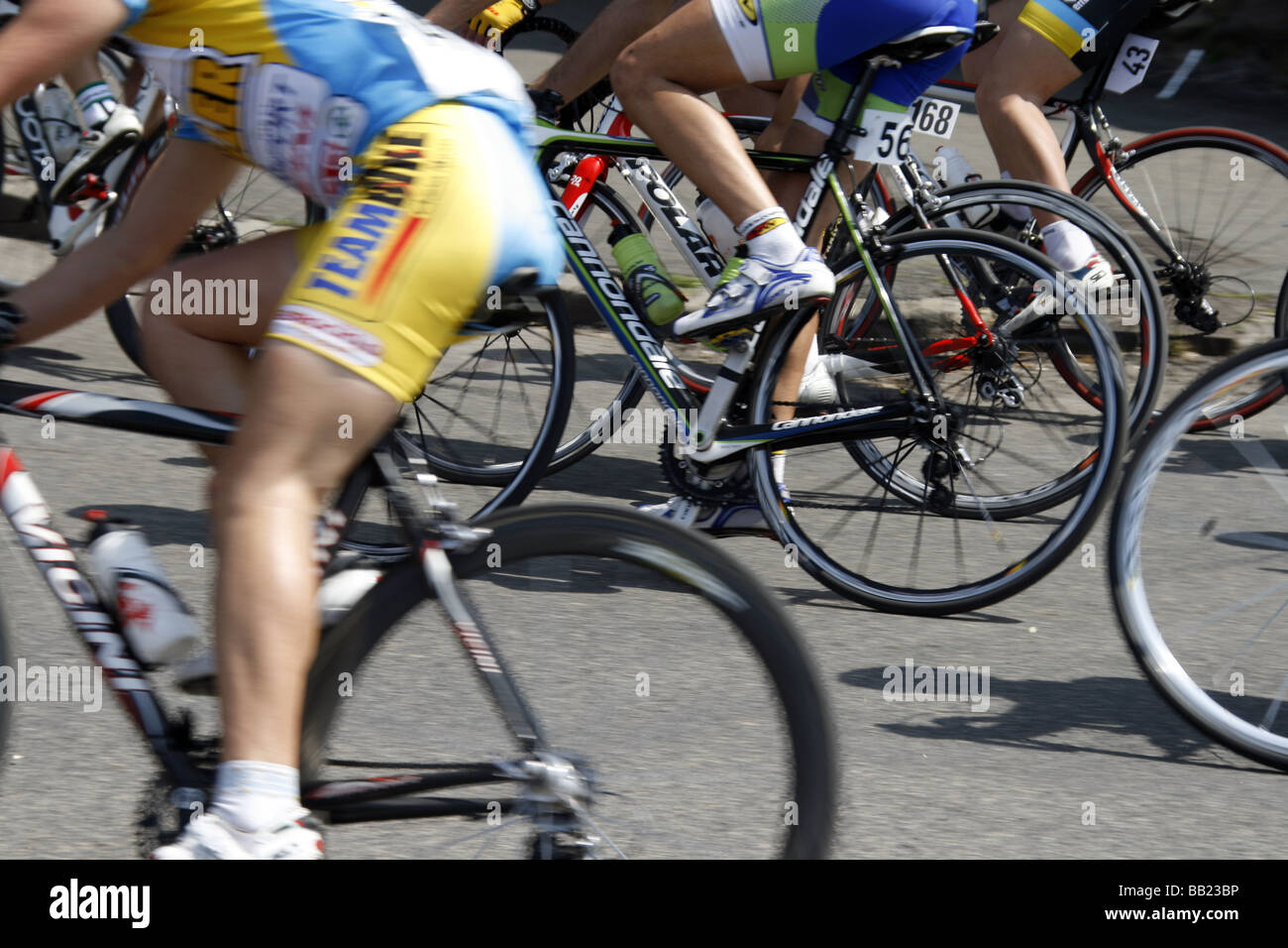professional bike riders in road street race in city town Stock Photo ...