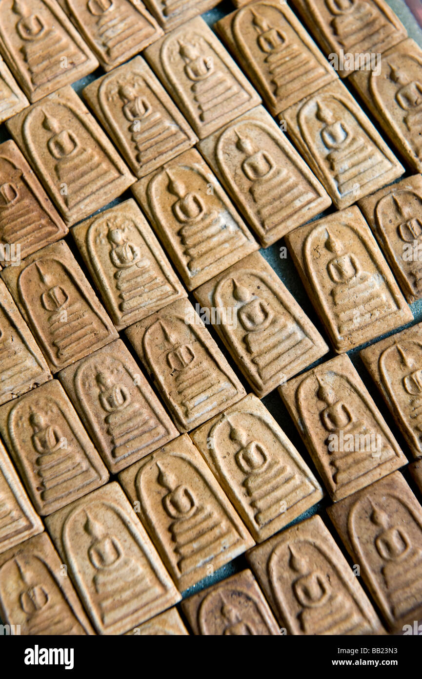 Amulets on display at an amulet market on Maharat Road, Bangkok ...