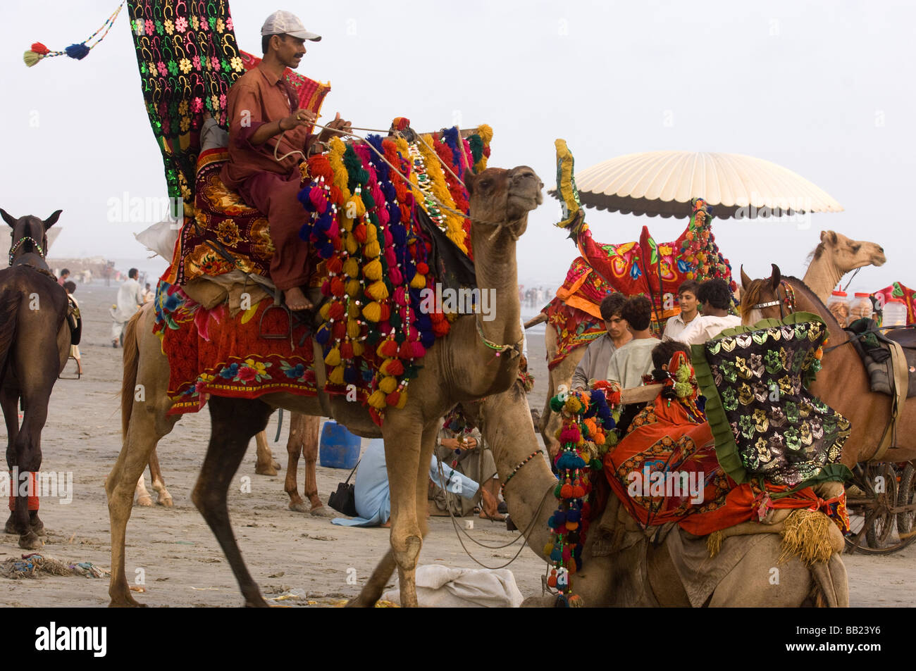 Pakistani s enjoying the camels and the sea on Clifton beach Karachi ...