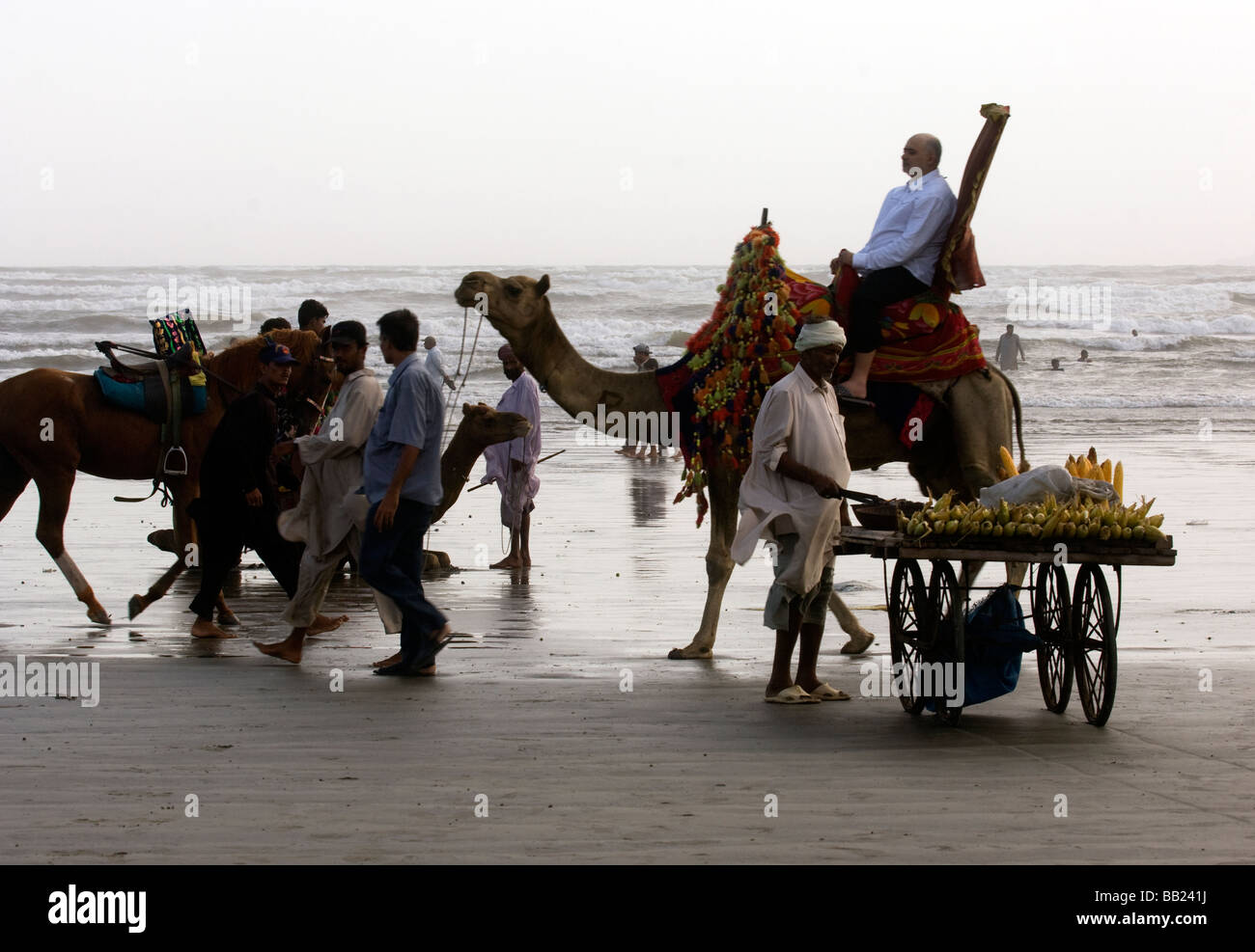 Pakistani s enjoying the camels and the sea on Clifton beach Karachi ...