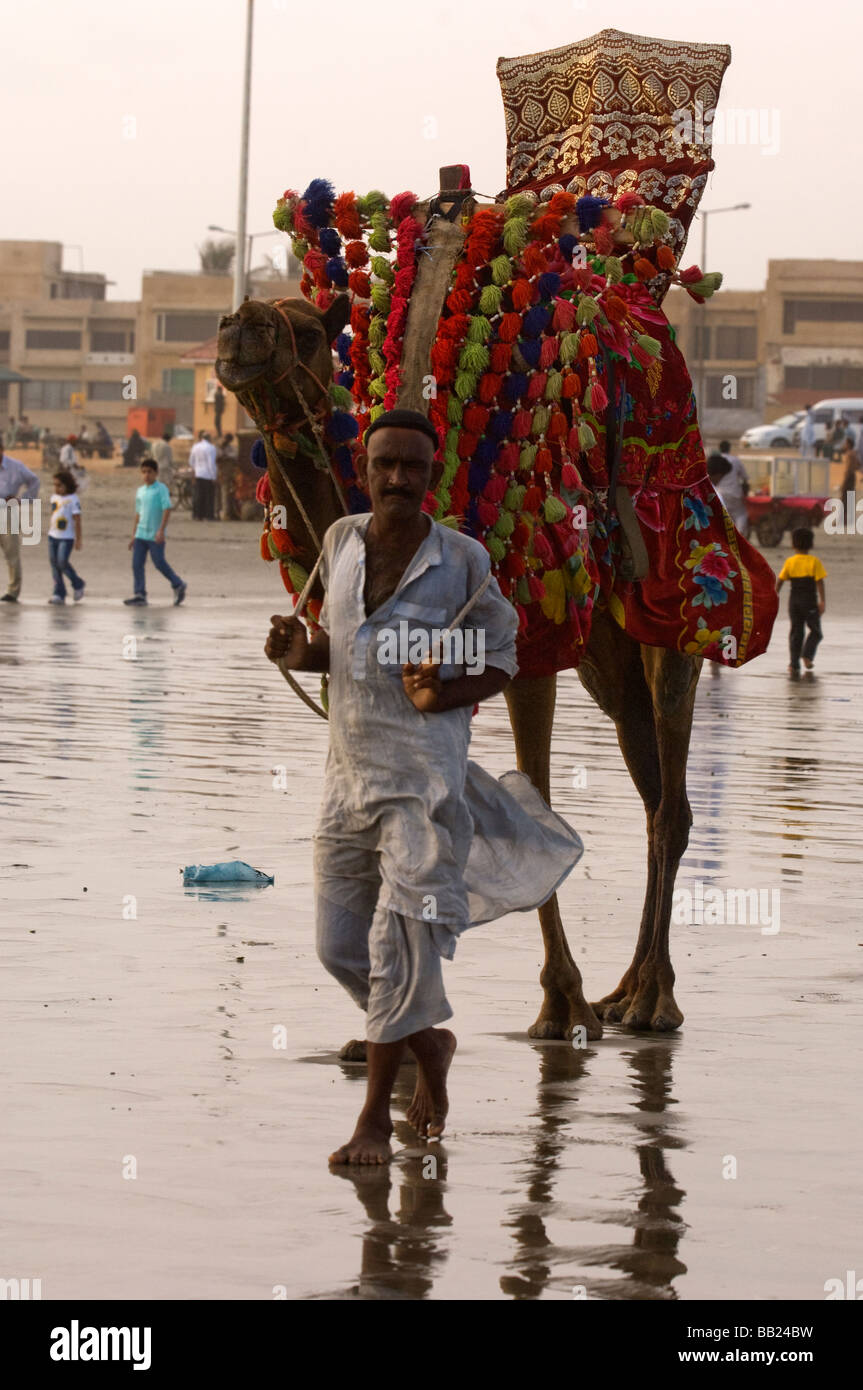 Pakistani s enjoying the camels and the sea on Clifton beach Karachi ...