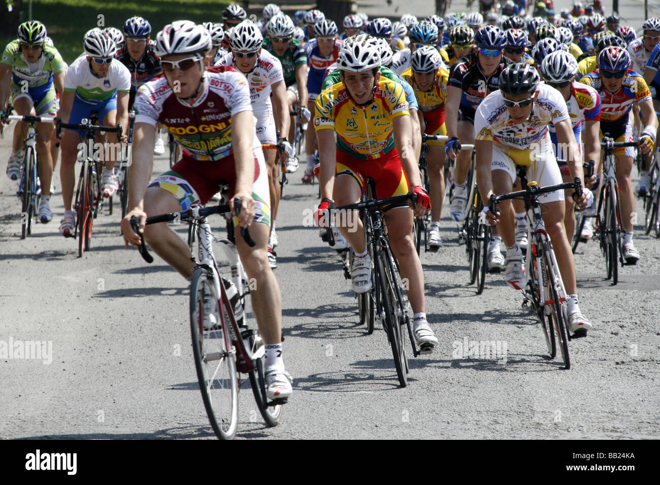 professional bike riders in road street race in city town Stock Photo ...