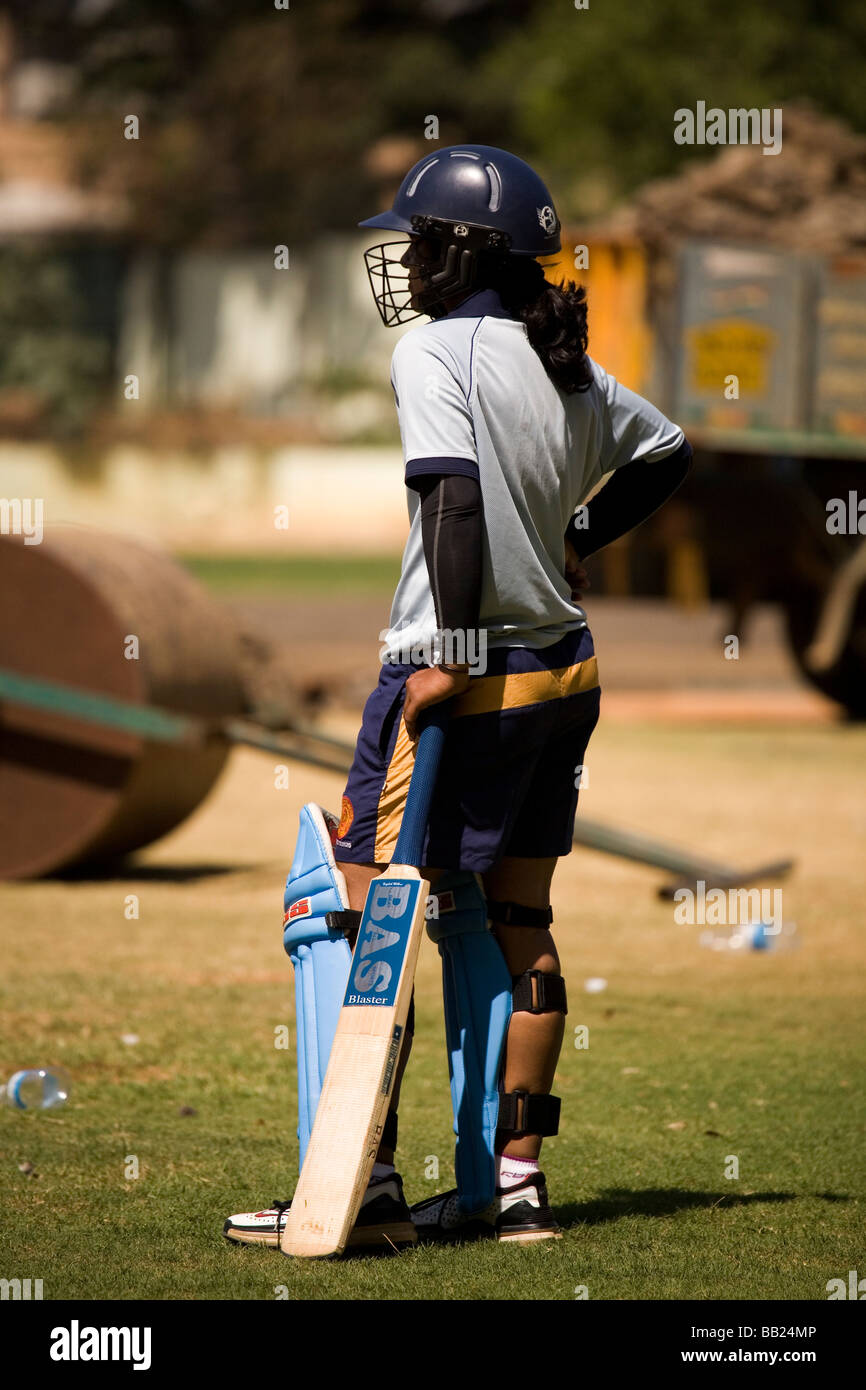 A batswoman a member of the India women's cricket squad waits to get ...