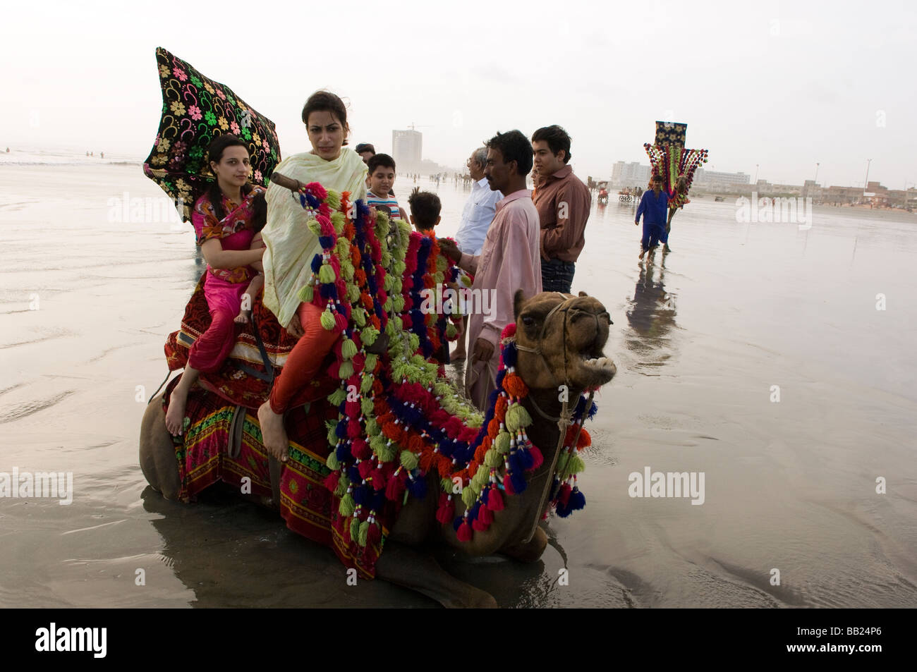 Pakistani s enjoying the camels and the sea on Clifton beach Karachi ...