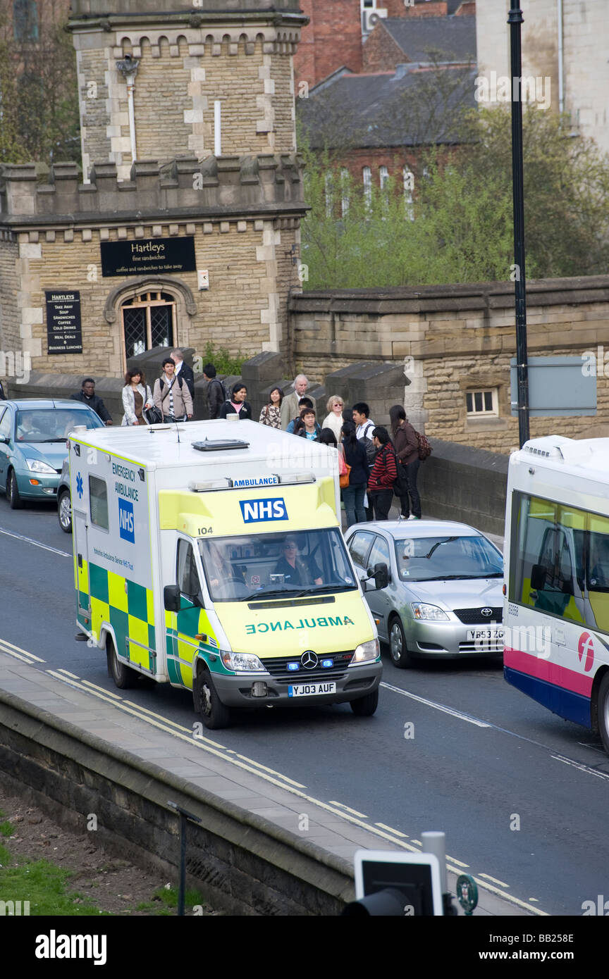 Ambulance Driving Through Traffic Stock Photos & Ambulance Driving ...
