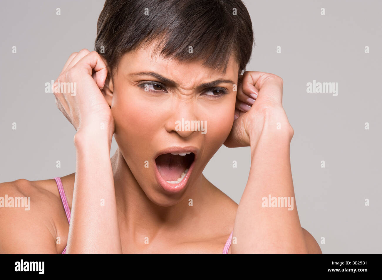 Close-up of a woman shouting Stock Photo - Alamy