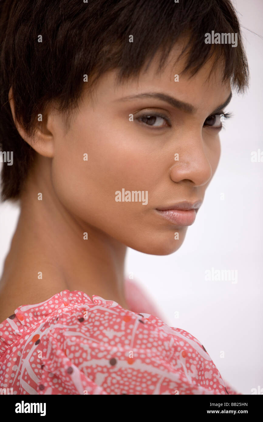 Portrait of a woman looking sad Stock Photo - Alamy