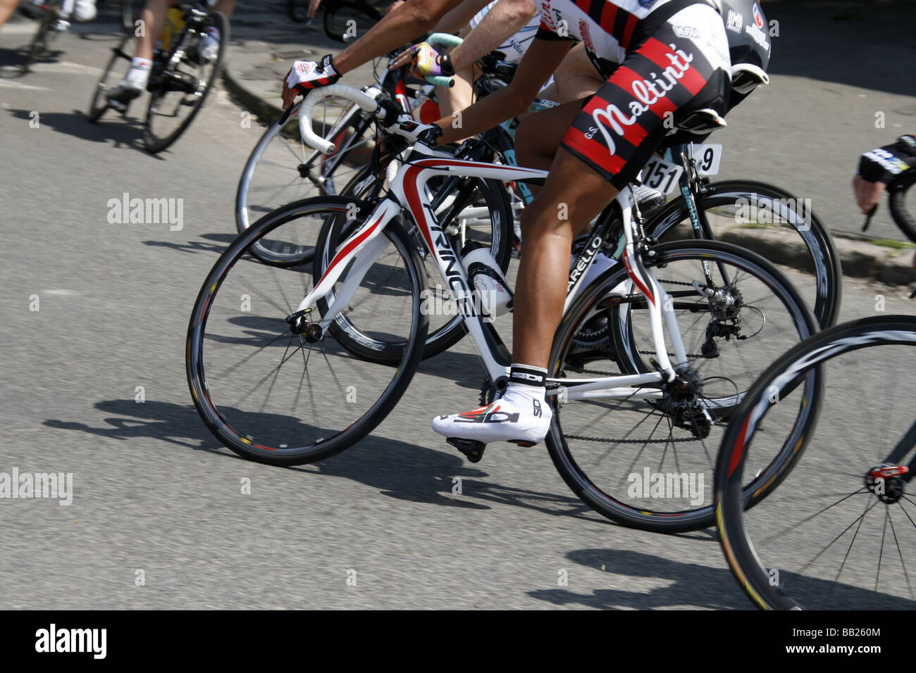 professional bike riders in road street race in city town Stock Photo ...