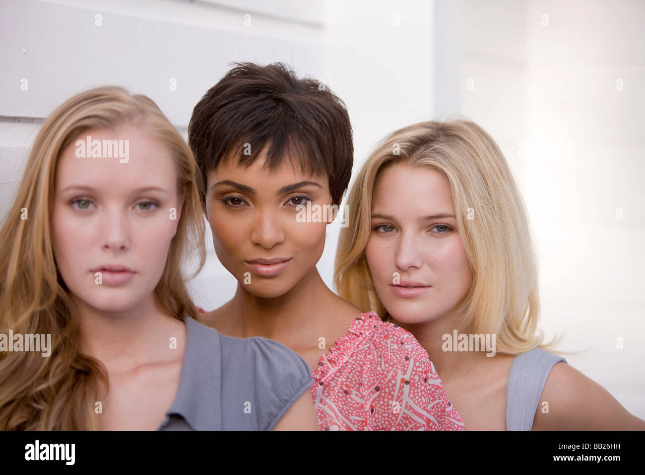 Portrait of three women posing Stock Photo - Alamy