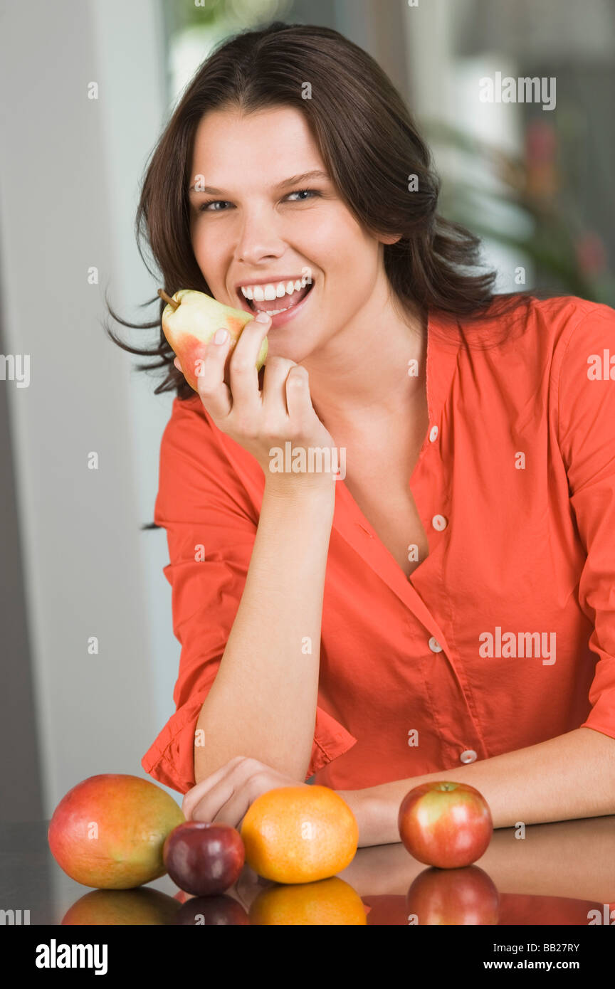 Biting into a pear hi-res stock photography and images - Alamy