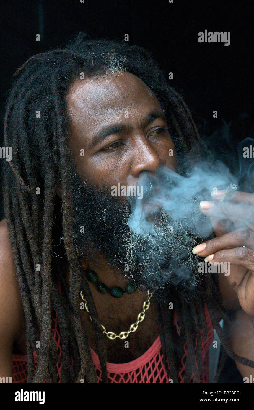 Rasta Man Smoking Joint Marijuana Stock Photos & Rasta Man Smoking ...