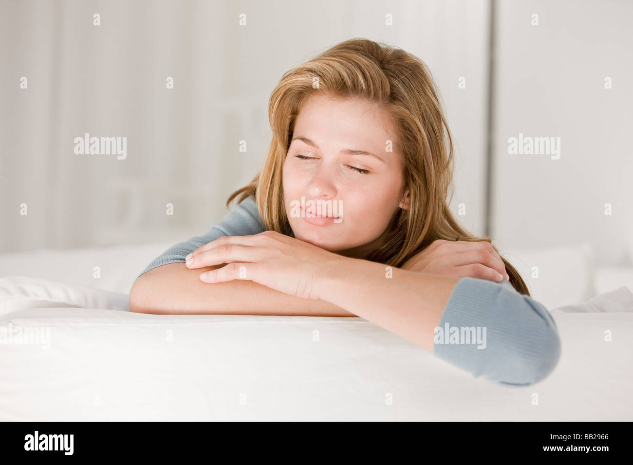 Close-up of a woman napping Stock Photo - Alamy