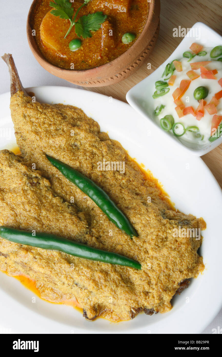 Doi ilish Hilsa or Ilish Mach is a popular fish dish from eastern part ...