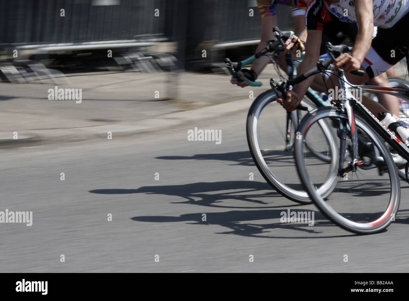 professional bike riders in road street race in city town Stock Photo ...