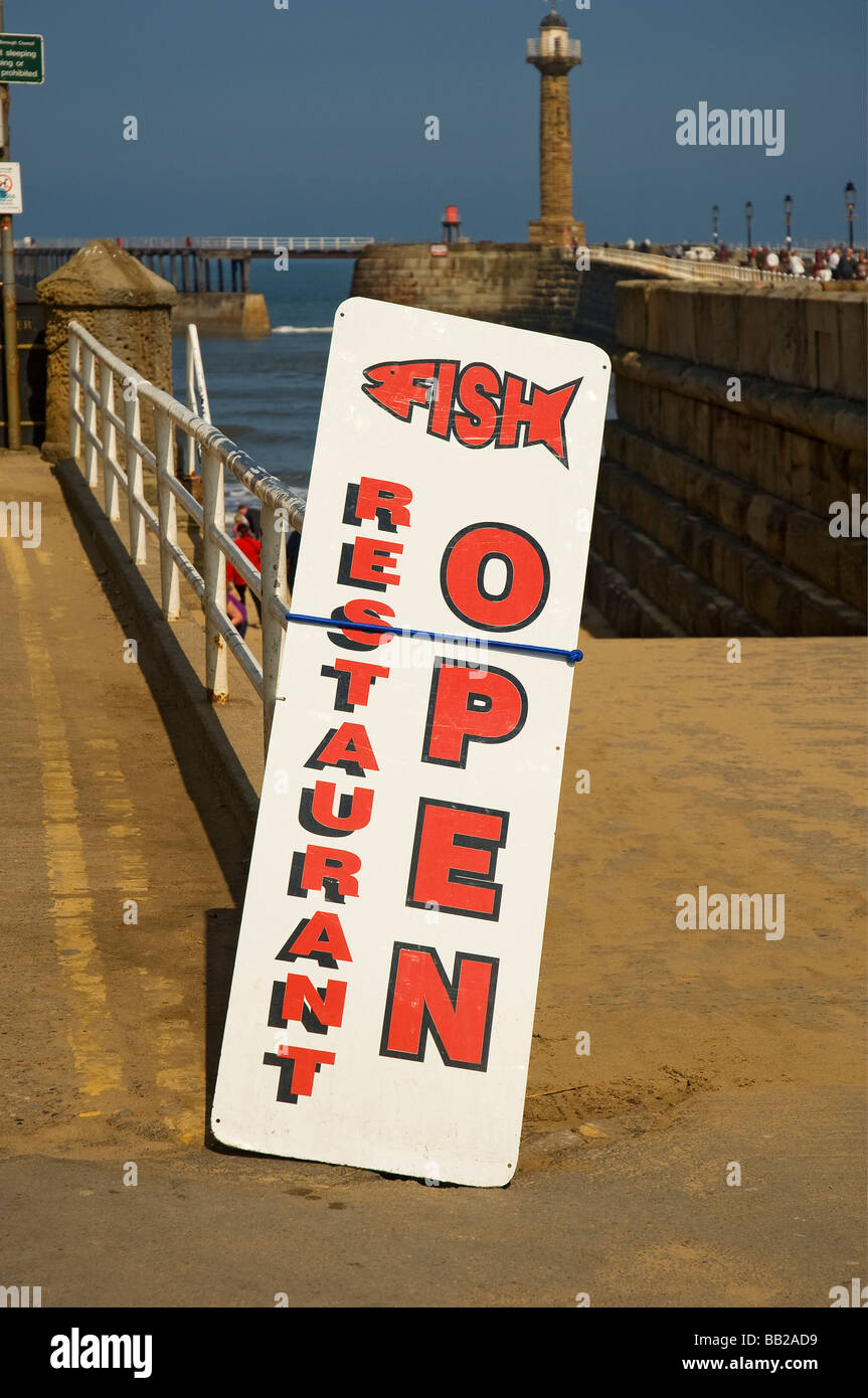 Close up of sign signboard for fish restaurant on the seafront at ...