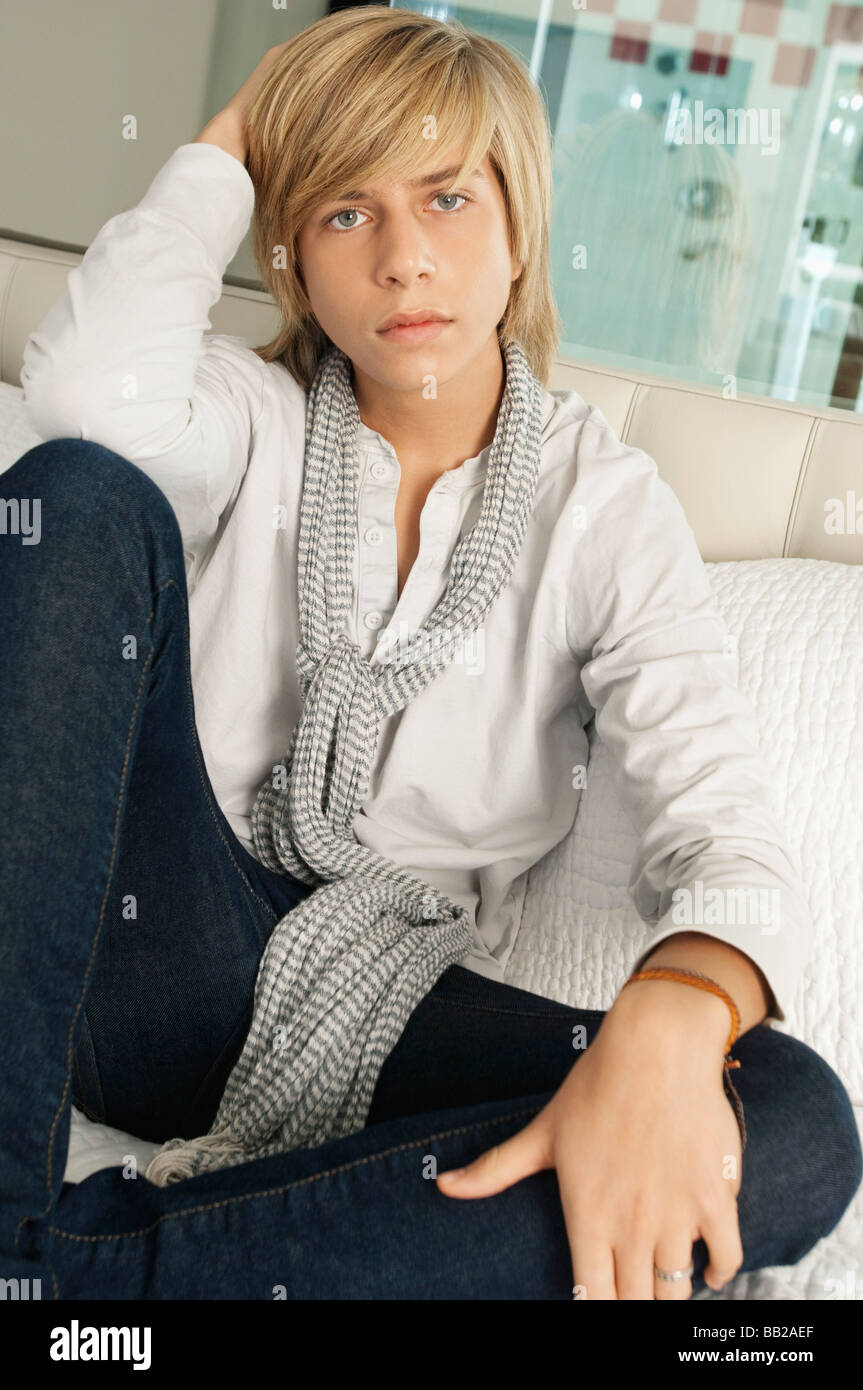 Portrait of a teenage boy looking serious Stock Photo - Alamy