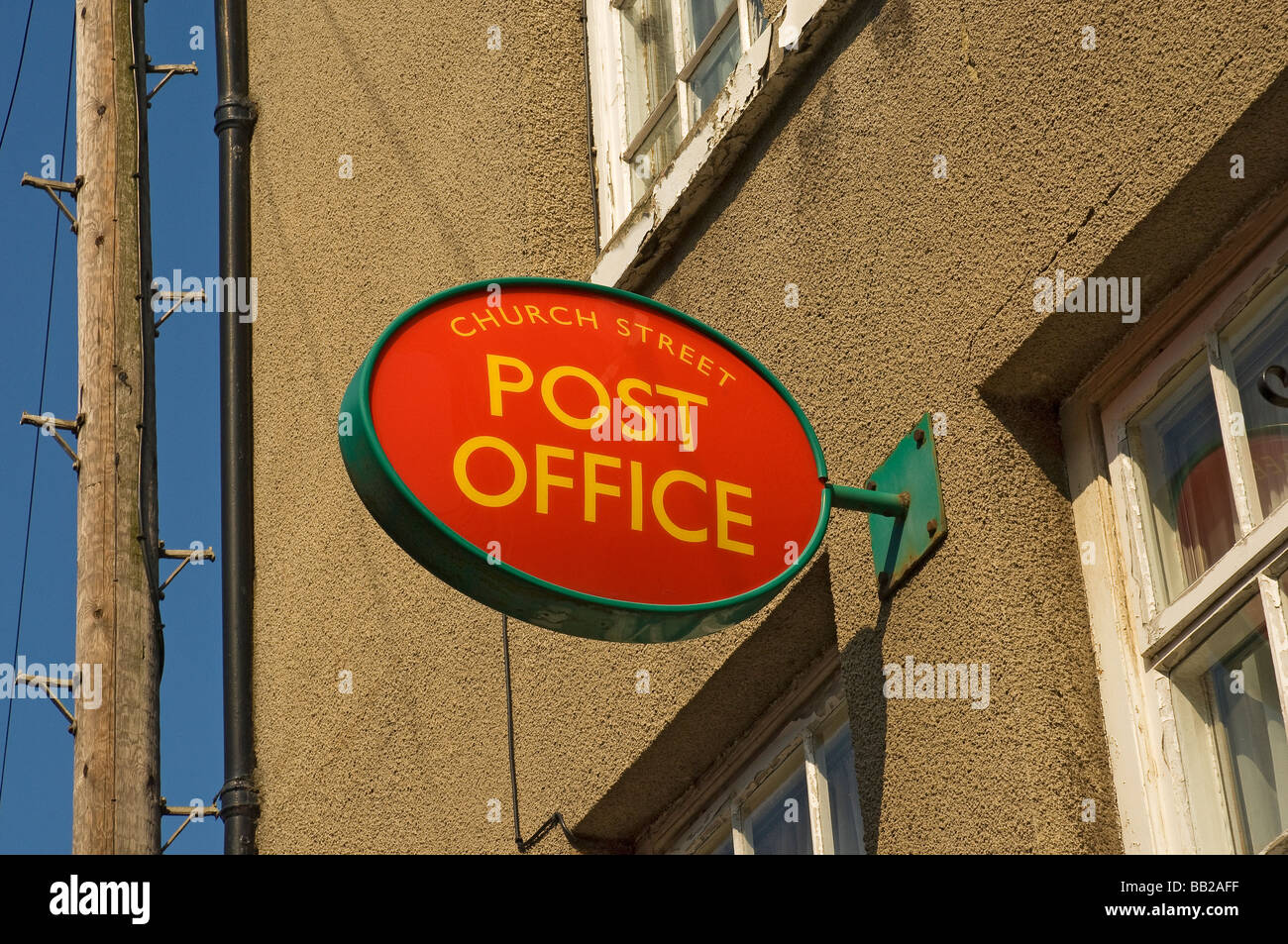 Red post office sign exterior close up above Church Street Whitby North ...