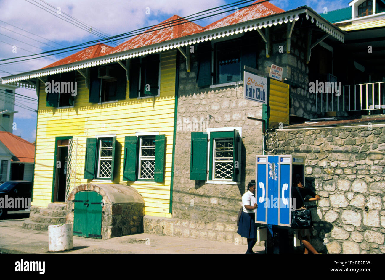 Caribbean, Dominica, Roseau. Traditional architecture and residents ...