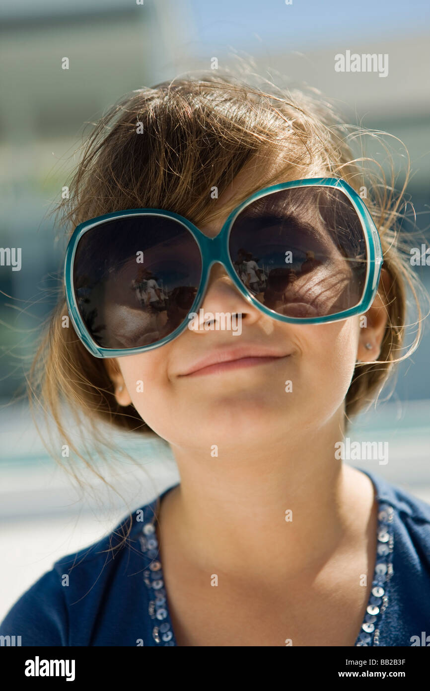 Girl wearing sunglasses Stock Photo - Alamy